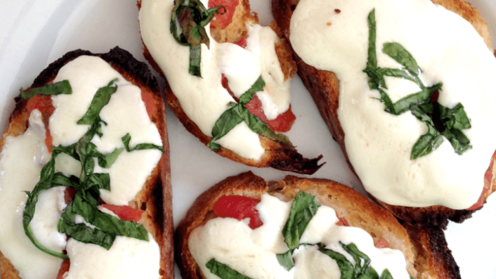 Melted Caprese Crostini - Amusing Foodie